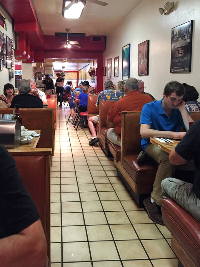 Every booth tells a story, every table holds memories, and everyone's waiting for that moment when their order arrives.
