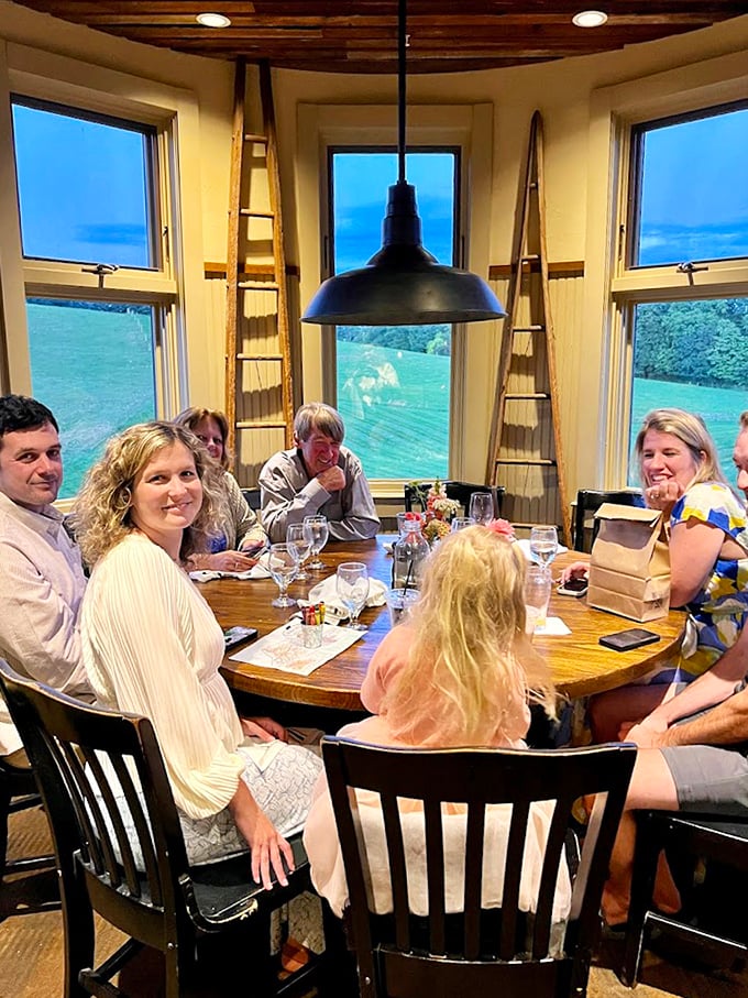 A window-side table with rolling hills beyond—dining with a view that changes with the seasons but always remains quintessentially New England.