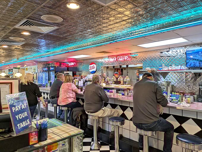 The counter crew serves up banter as fresh as the coffee to regulars perched on chrome stools – a morning ritual as essential as the breakfast itself.