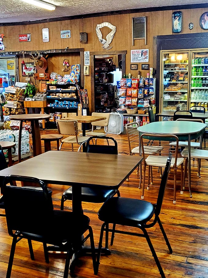 Snacks stacked with purpose—the bread and butter of any respectable general store. That wall-mounted deer has seen it all.