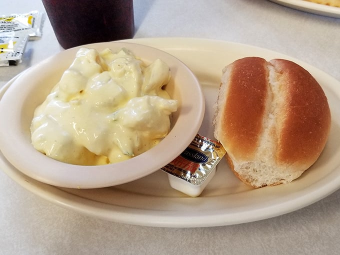 Potato salad and a dinner roll—simple sides that complete the plate. Sometimes the supporting actors deserve their own standing ovation. 