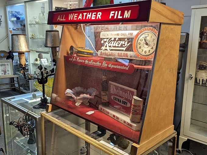 When you need film in any weather—vintage advertising displays like this remind us of life before smartphones, when photography required patience and chemistry. 