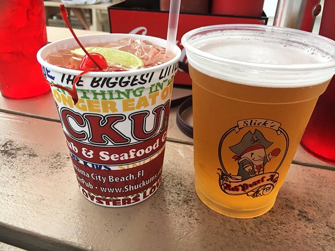 Cold beer and a colorful cocktail—the perfect liquid companions for a seafood feast. That lime garnish isn't just for show.