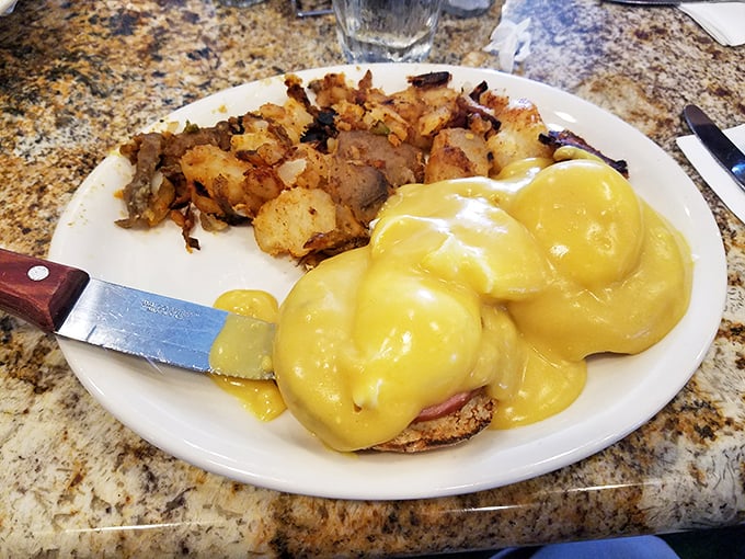 Eggs Benedict isn't just breakfast—it's a golden-sauced masterpiece that makes you wonder why we don't put hollandaise on everything.