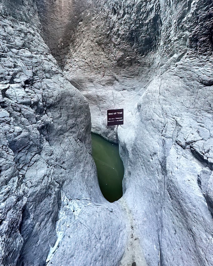 "End of Trail" might be the sign, but it's really the beginning of wonder. This limestone canyon's emerald pool looks like Mother Nature's secret spa treatment.