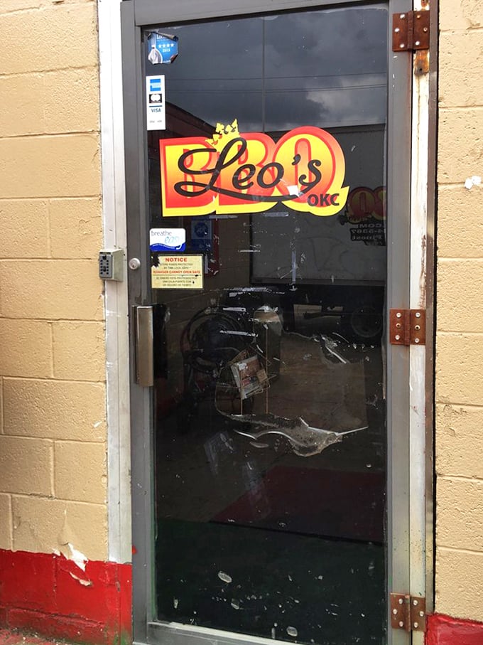 The entrance to Leo's—where that first push of the door releases a waft of smoky promise that makes your stomach applaud.