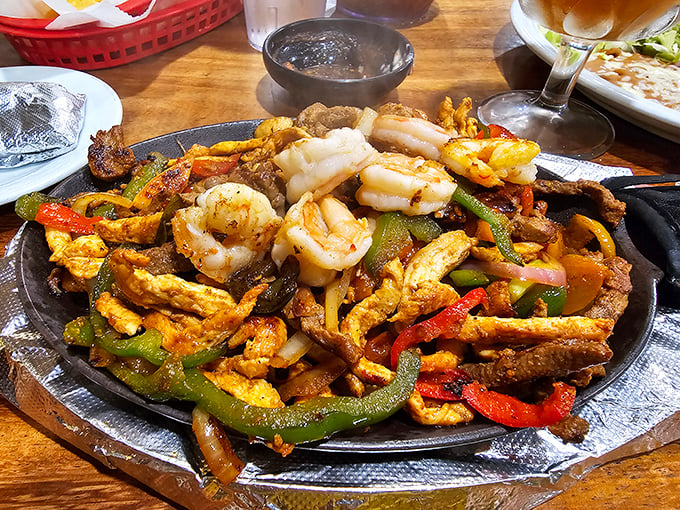 This sizzling fajita platter doesn't just arrive at your table—it makes an entrance worthy of a standing ovation.