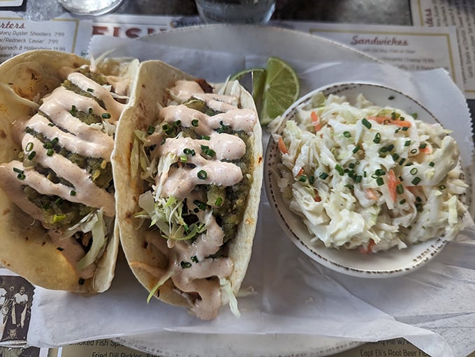 Fish tacos that tell a story with every bite – the sauce drizzled on top is writing poetry about the sea.