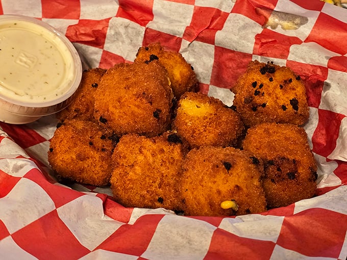 These golden nuggets of fried cheese aren't just appetizers—they're little crispy promises that the kitchen understands the importance of life's simple pleasures.