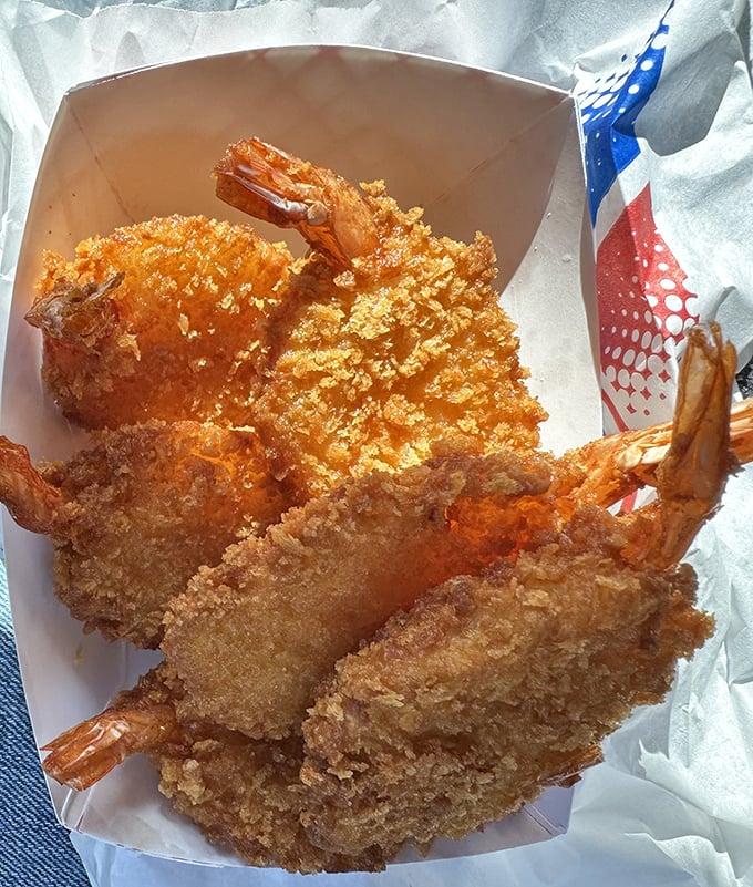 These golden-battered shrimp aren't just fried – they're transformed into crunchy vessels of seafood perfection that would make coastal restaurants jealous.