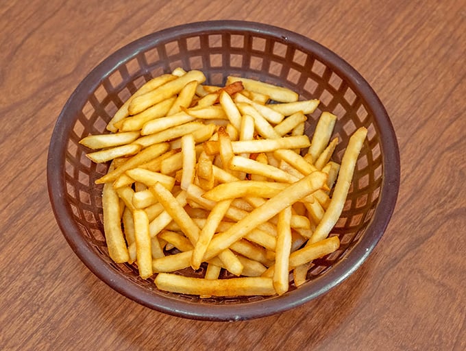 French fries in their natural habitat – a brown basket waiting to be the perfect vehicle for sopping up any stray barbecue sauce.