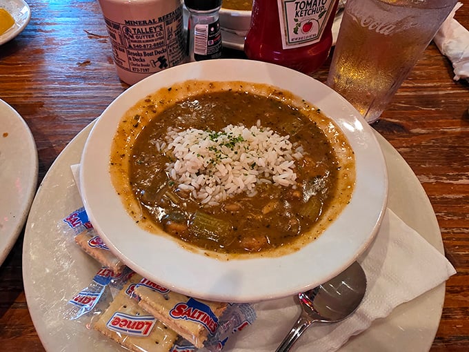 This isn't just gumbo; it's a bowl of Louisiana-Florida diplomacy—rich roux, tender vegetables, and seafood that tastes like it jumped from the Gulf this morning.
