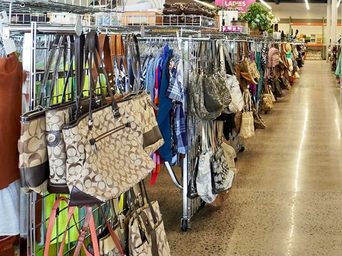 Handbag heaven stretches as far as the eye can see—designer knockoffs mingling democratically with genuine vintage finds in a carousel of possibility.