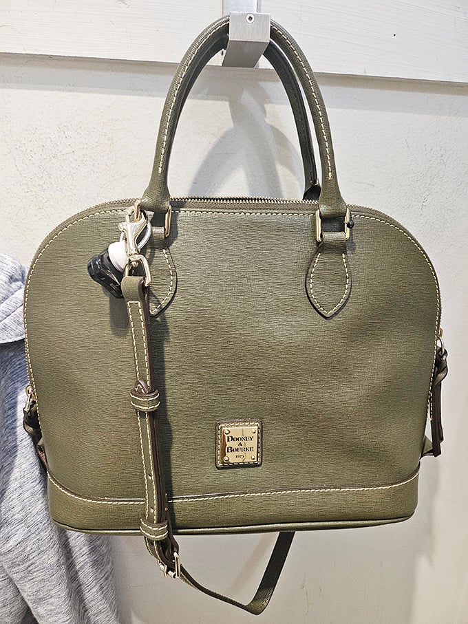This Dooney & Bourke handbag isn't just arm candy—it's proof that luxury can be accessible. Previously loved but still sophisticated, like George Clooney.