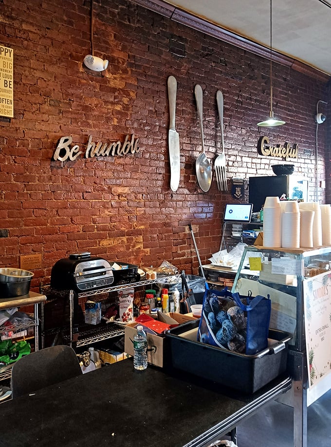 Words to live by on the exposed brick wall – "Be humble" and "Grateful" – wisdom that pairs perfectly with soul-satisfying meals.