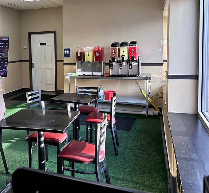 Self-serve drink station and simple seating—because they've put all their energy where it matters most: in the kitchen.