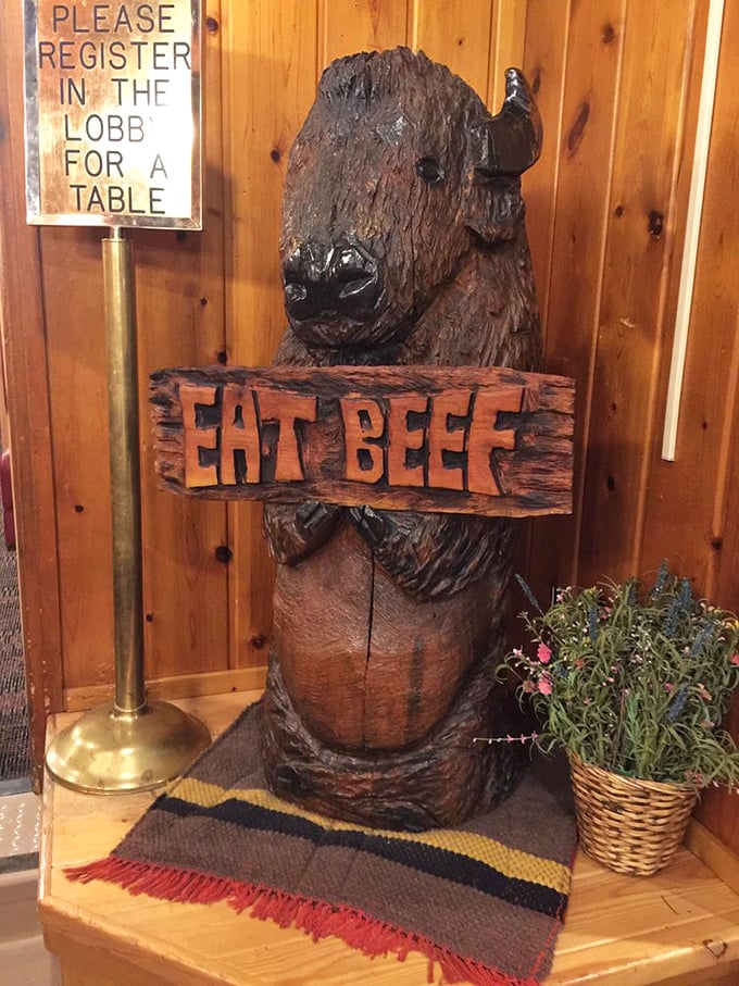That wooden buffalo statue isn't just decor – it's a philosophical statement: "Eat Beef" is less a suggestion than a commandment here.