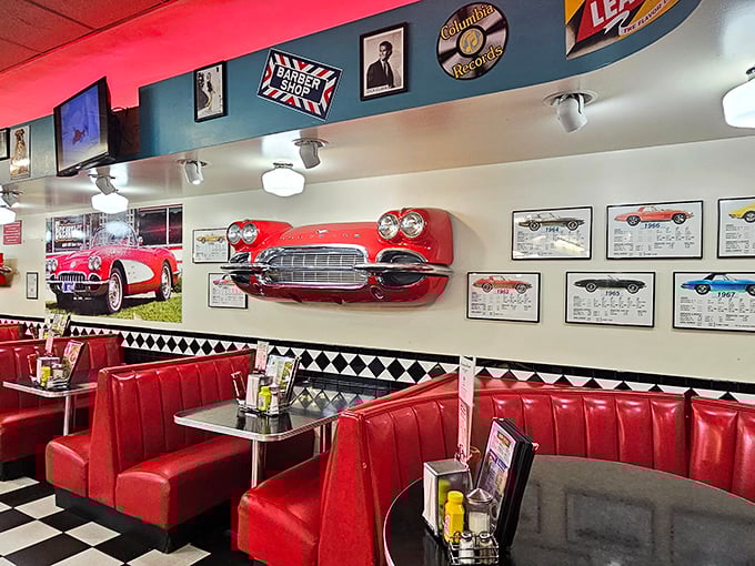 Classic cars aren't just for driving—sometimes they're for dining next to. Those red booths have supported more happy diners than a cardiologist's waiting room after free donut day.
