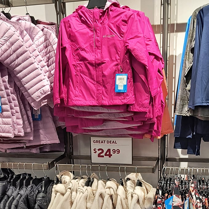 Columbia jackets marked "GREAT DEAL" – because nothing says "I'm prepared for that one week of Mississippi winter" quite like a bright pink raincoat.