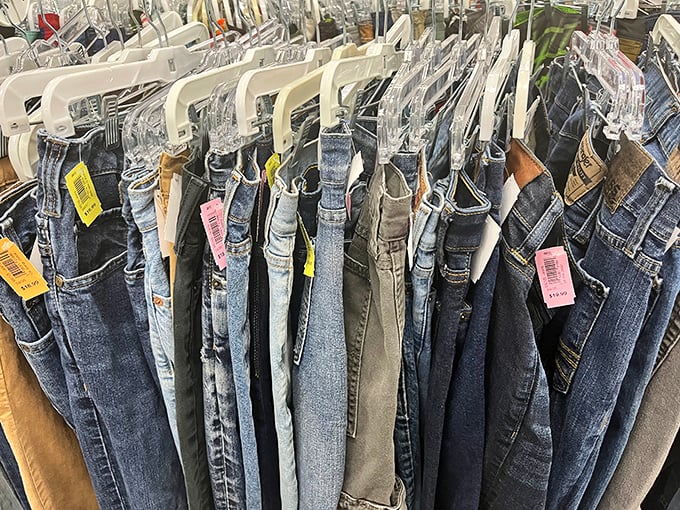 Denim heaven! Each pair tells a different story – from broken-in work jeans to designer labels that somehow landed in this bargain hunter's paradise.