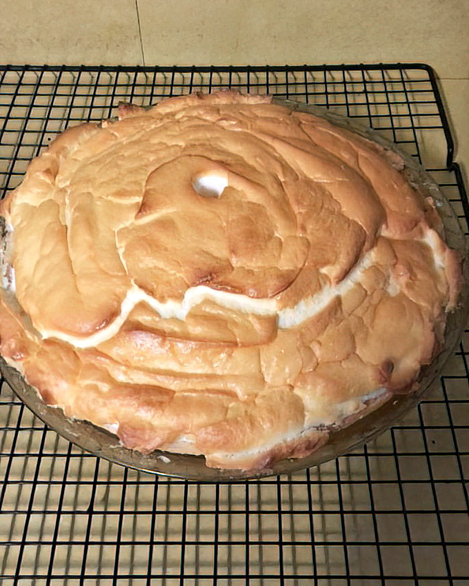 Lemon meringue pie with peaks that reach for the heavens. This isn't dessert – it's a fluffy, tangy monument to the art of baking. 
