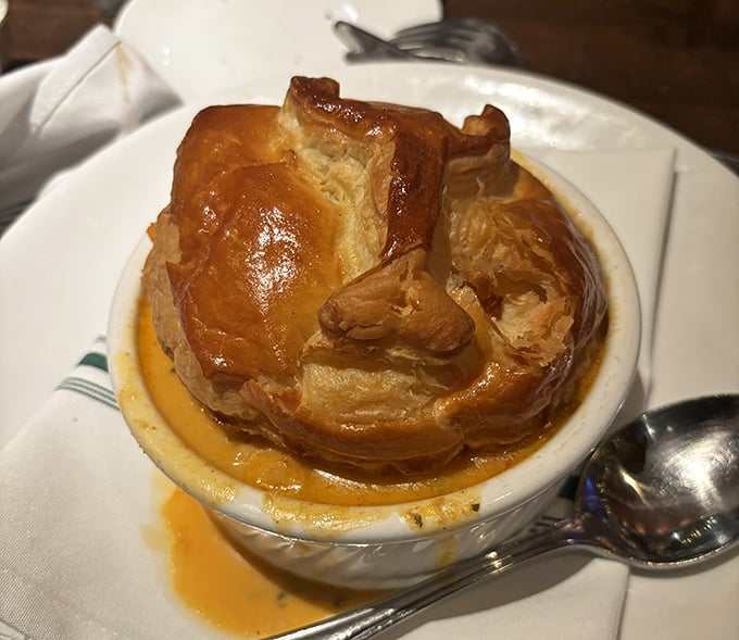 This isn't just pot pie – it's an architectural marvel of golden pastry hiding a creamy treasure of lobster beneath its domed ceiling.