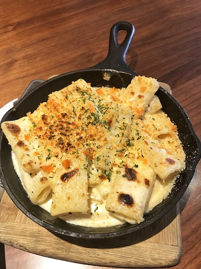 Mac and cheese that's achieved the perfect crispy-to-creamy ratio—the kind that makes you want to build a tiny house and live inside it.