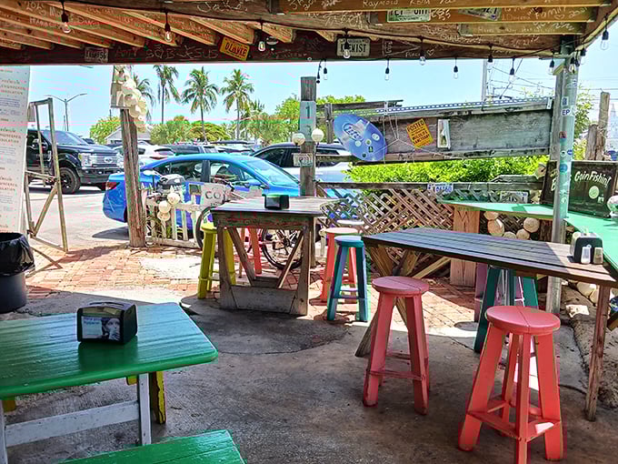 Colorful stools and weathered tables create the perfect perch for attacking a plate of the day's fresh catch.