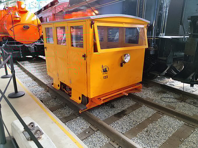 The bright yellow motor speeder—affectionately known as a "track rabbit"—served as the railroad worker's faithful commuter vehicle.