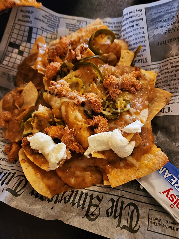 Seafood nachos – where Tex-Mex meets the Gulf Coast in a newspaper-lined basket of crispy, cheesy, seafood-topped rebellion against ordinary appetizers.