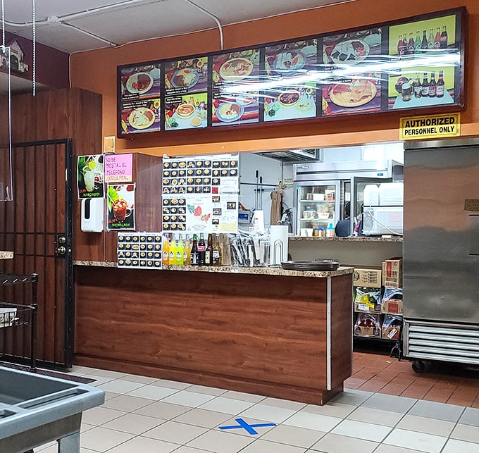 The order counter – where dreams become reality and hunger meets its match. Those menu photos above are like a preview of coming attractions.
