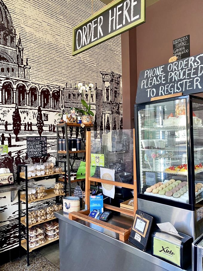 The ordering counter: where decisions are made and diets are forgotten. That wall mural isn't decoration—it's a conversation starter while you deliberate.