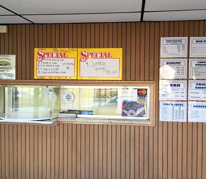 The ordering counter—where dreams are placed and fulfilled with the efficiency that comes from decades of serving hungry Detroiters their barbecue fix.