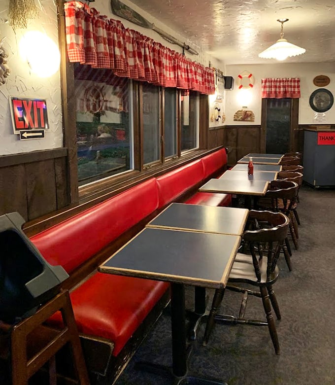 Red vinyl booths and nautical touches create the perfect backdrop for seafood feasting. No distractions from the main event.