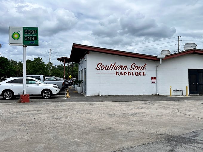 The converted gas station exterior tells you everything—this place cares more about what's smoking out back than fancy facades.