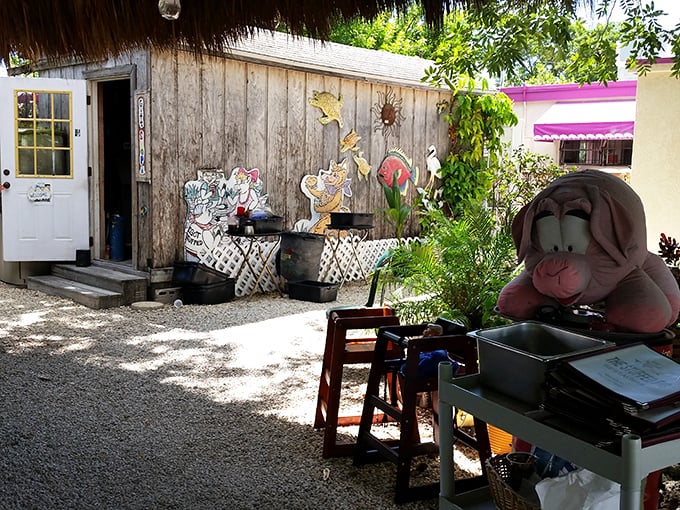 The outdoor seating area blends Keys casual with pig-themed charm – a perfect spot to enjoy breakfast under the Florida sunshine.