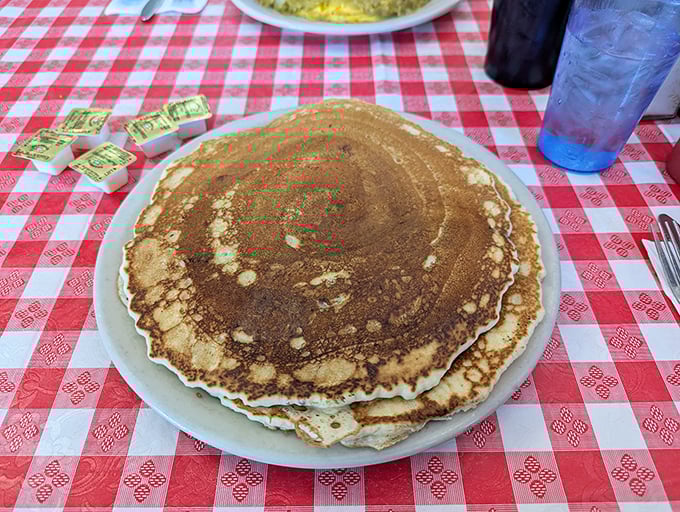 Pancakes the size of hubcaps with that perfect golden-brown exterior. These aren't just breakfast—they're an engineering achievement worthy of study.