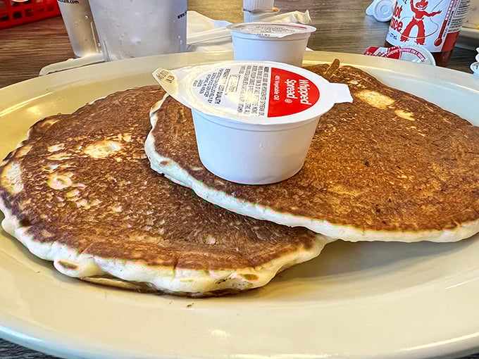 These pancakes aren't just breakfast—they're fluffy golden discs of joy that make you wonder why we don't eat breakfast for every meal.