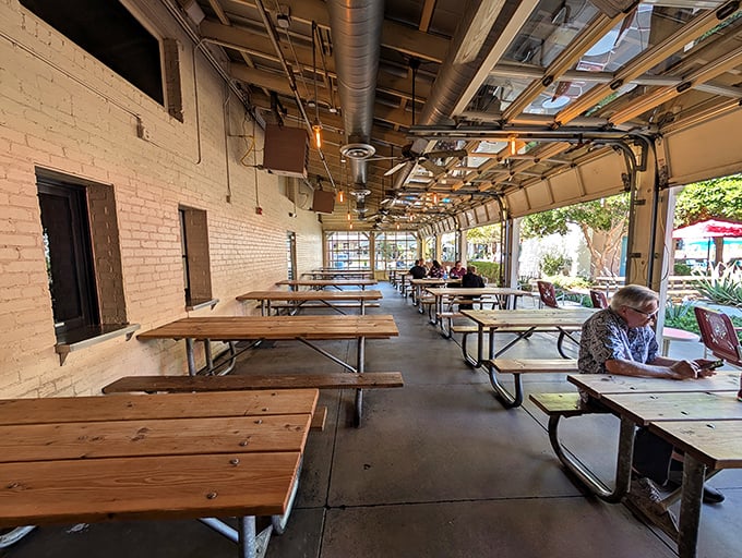 The covered patio offers a breezy respite for enjoying your barbecue bounty while watching Gilbert go by.