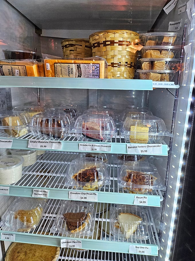 The dessert case—where willpower goes to surrender. Each pie and cake patiently waiting its turn to ruin your diet plans.