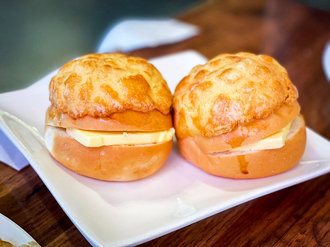 Pineapple buns that contain no actual pineapple—just golden, buttery goodness that makes you question why all bread doesn't aim this high.