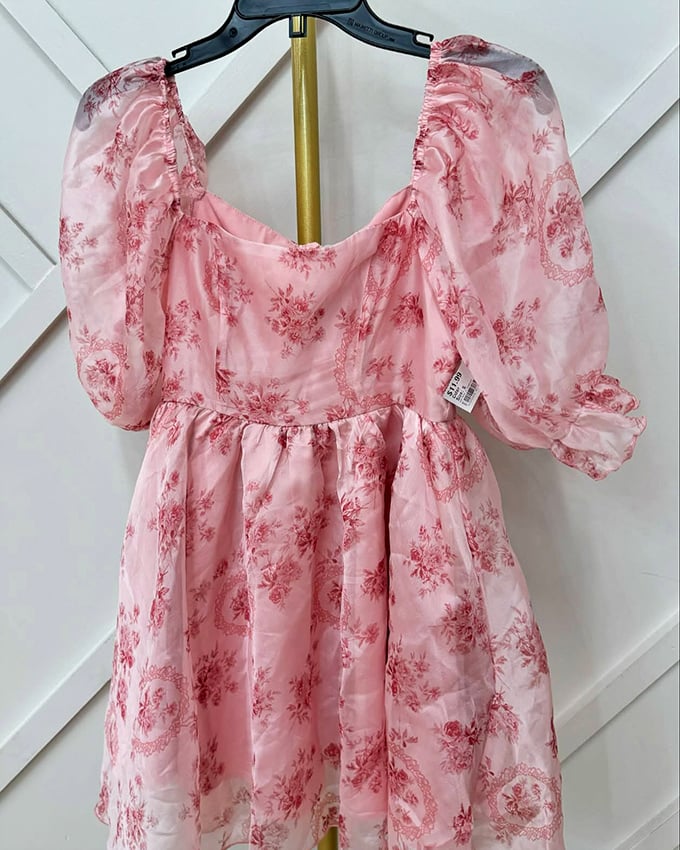 Cottagecore dreams come true in this pink floral confection – perfect for garden parties or pretending you're the main character in a Jane Austen novel.