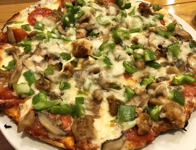 This isn't artisanal wood-fired pizza with imported ingredients – it's honest, hearty, and exactly what you're craving right now.