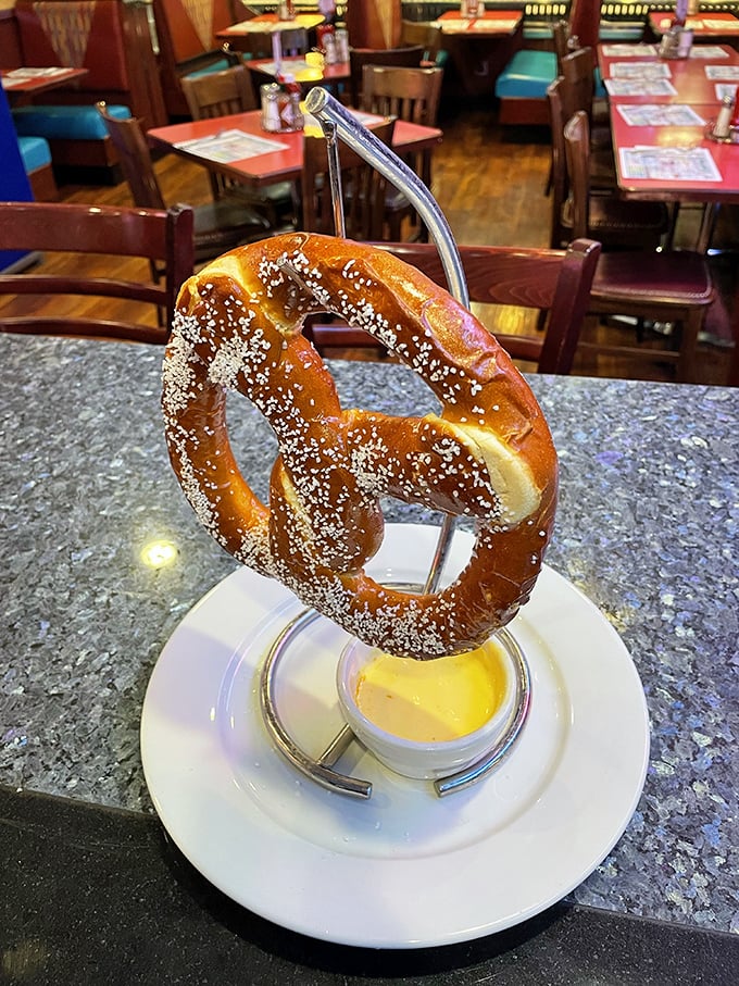 Not just any pretzel—a pretzel that's been to the gym. Served hanging like edible jewelry with a side of liquid gold dipping sauce.