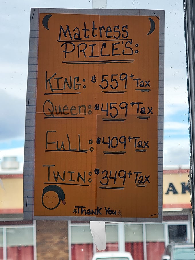 Mattress prices scrawled on orange paper—complete with hand-drawn moons and a smiley face—add homespun charm to serious savings.