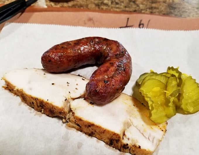 Turkey and sausage with pickle chips – proof that Baker Boys' talent extends beyond brisket. That sausage has a snap that would make a percussion section jealous.