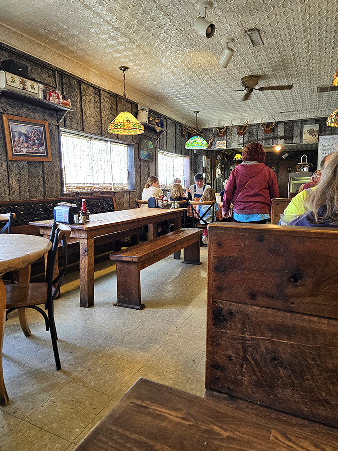 Family-style seating encourages conversation with neighbors – because nothing builds community like sharing stories over plates of Southern comfort food. 