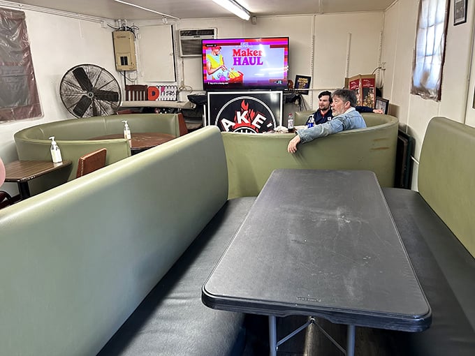 The dining room at Jake's proves my theory: inverse relationship between décor budget and food quality. These booths have cradled countless BBQ euphoria moments.