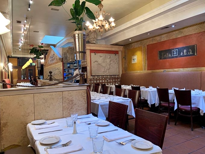 White tablecloths and warm lighting create the perfect backdrop for food romance. Every table tells a story—yours is about to begin.