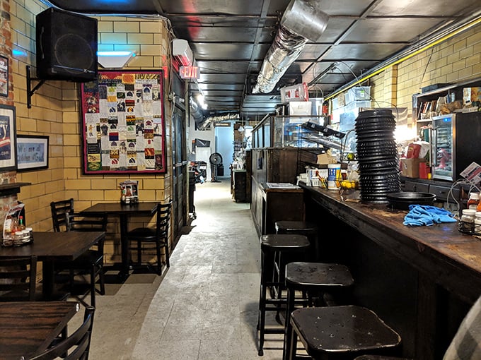 The narrow hallway and simple seating say "focus on the food"—advice you'll be glad you followed after the first bite. 